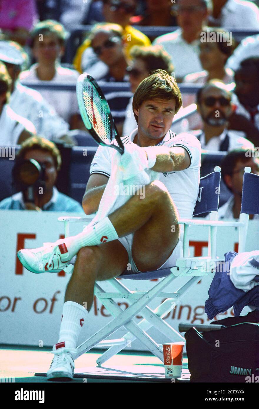 Jimmy Connors (USA) during a change over competing at the 1989 US Open ...