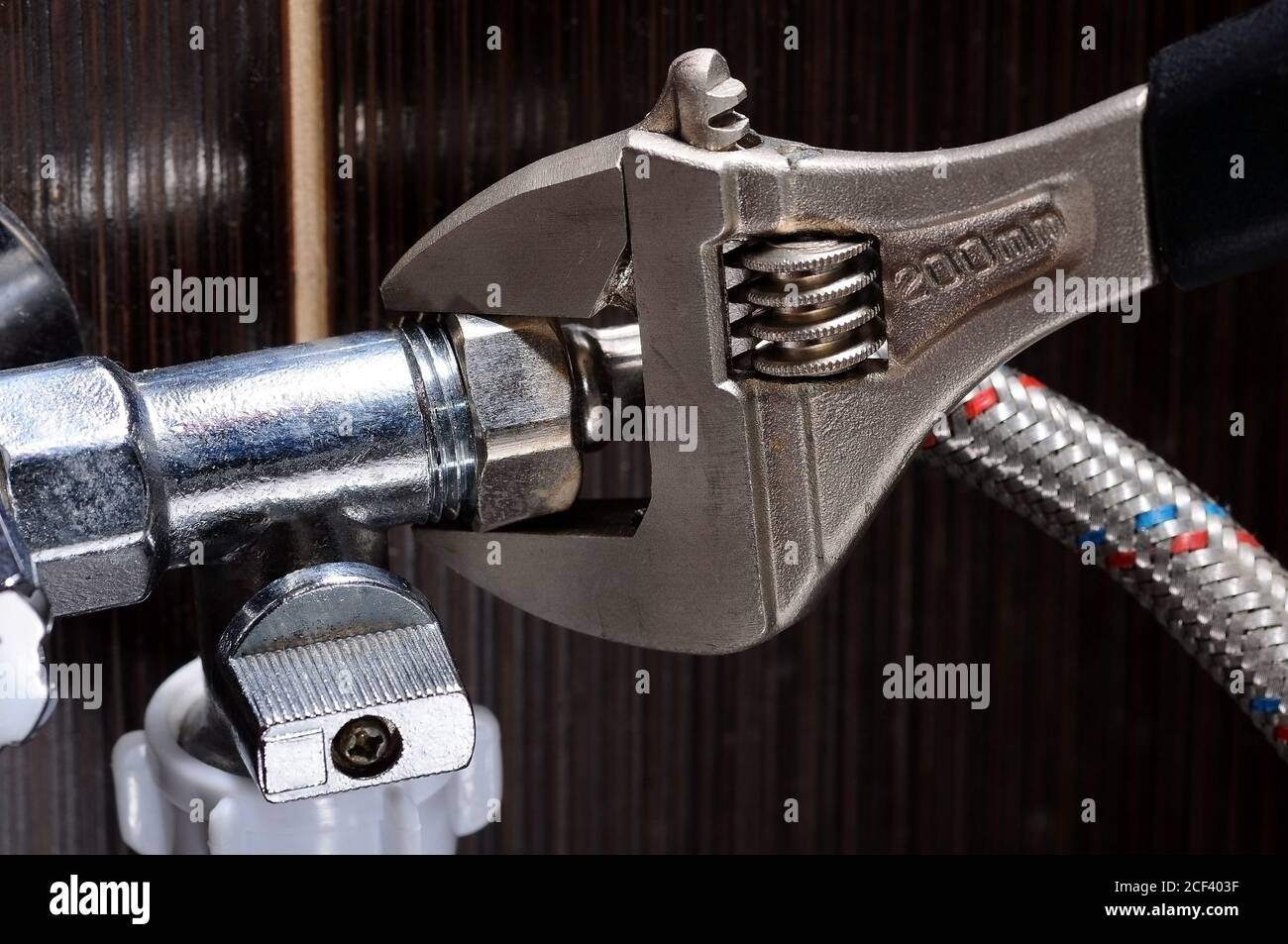 Domestic plumbing connections hoses Stock Photo - Alamy