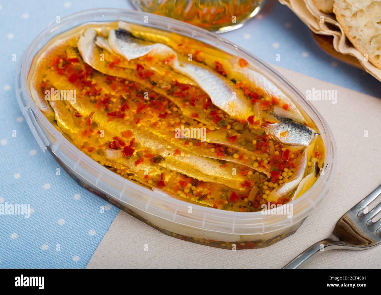 Preserved sea fish, marinated sardines or herring Stock Photo - Alamy