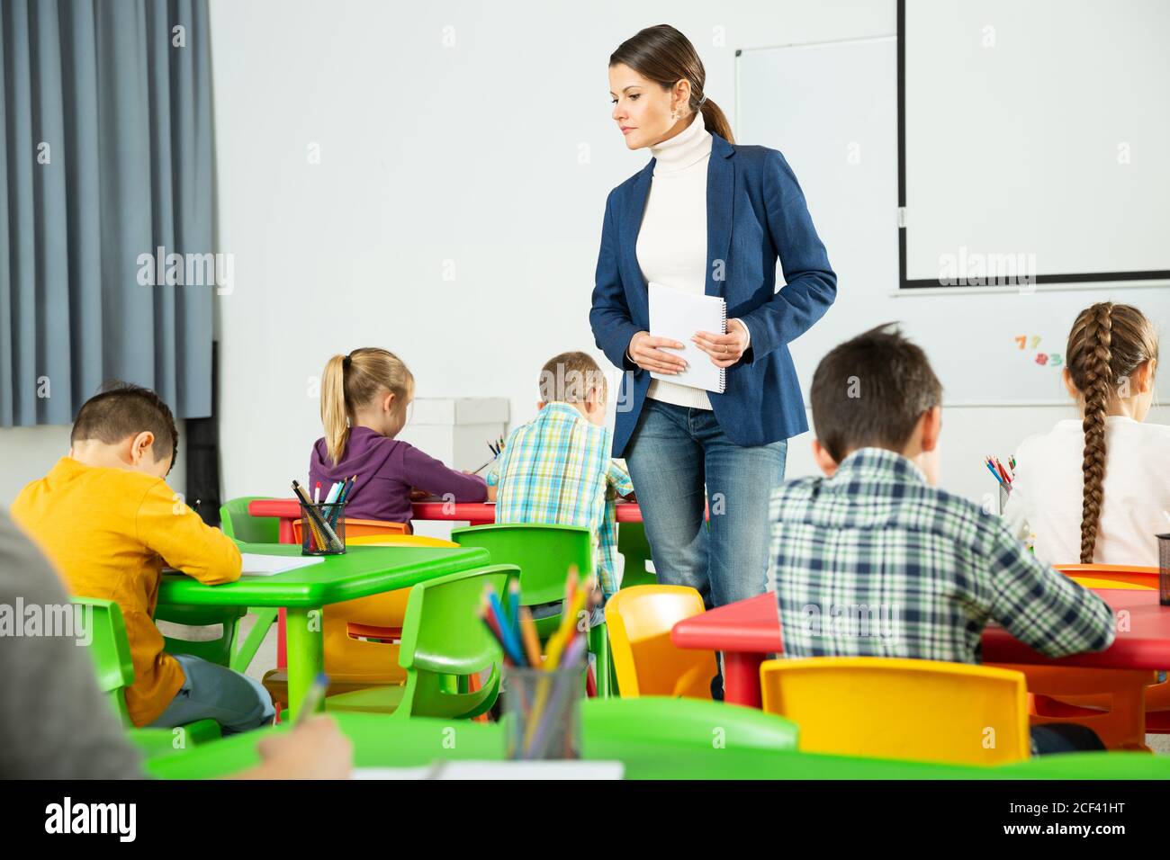 Children Walking In Classroom