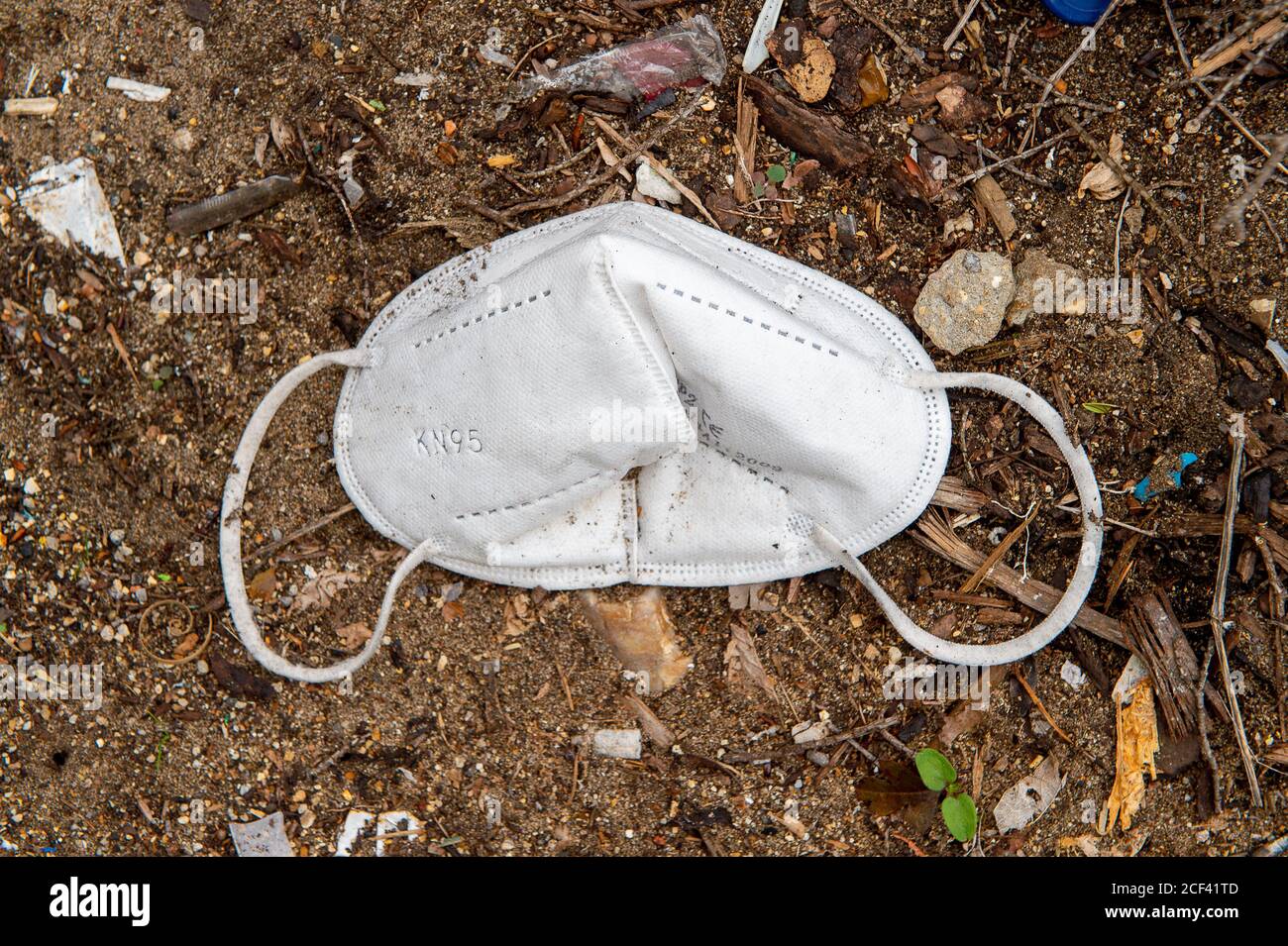 Slough, Berkshire, UK. 3rd September, 2020. A discarded KN95 face mask ...