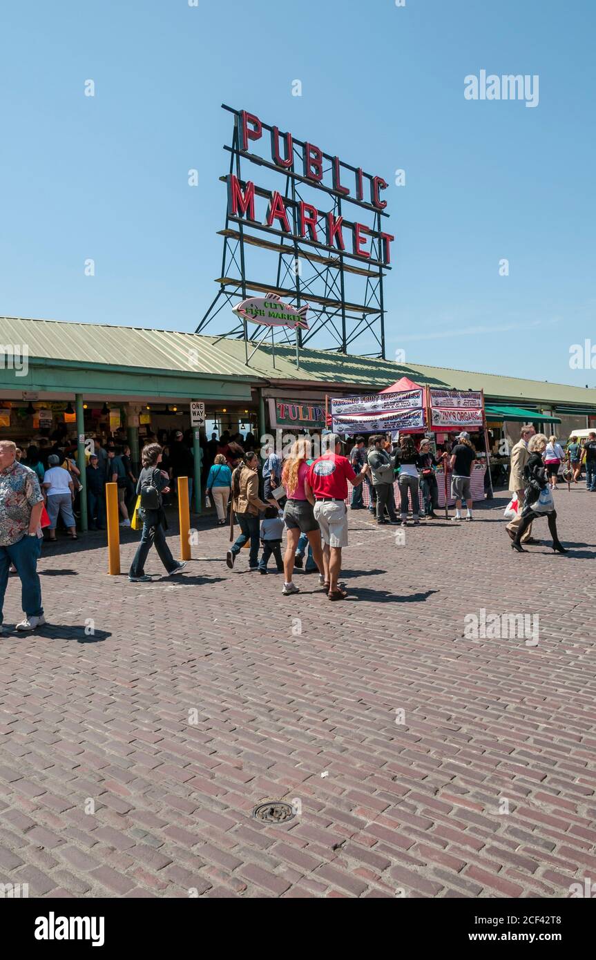 People in scenes from Pike Place Market in Belltown in Seattle ...
