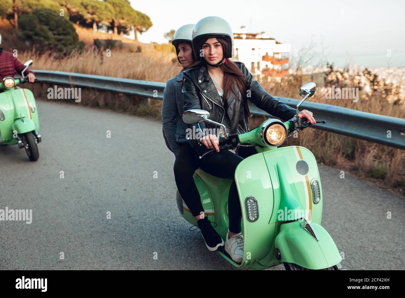Young people driving motorcycle hi-res stock photography and images - Alamy