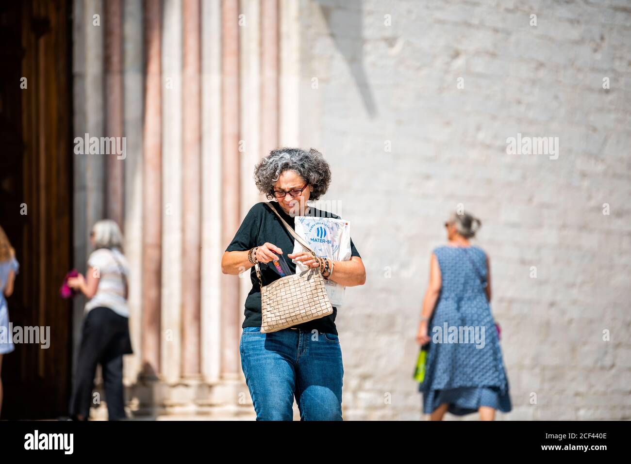 Assisi, Italy - August 29, 2018: Woman people tourists in Umbria city ...