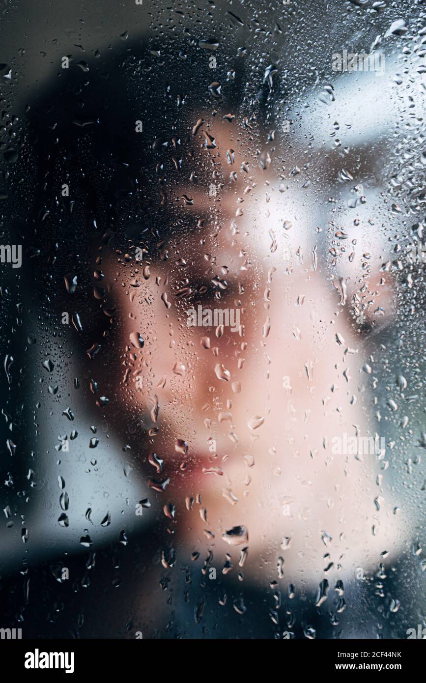 Closeup Of Unhappy Unrecognizable Person Standing Alone Behind Steamy