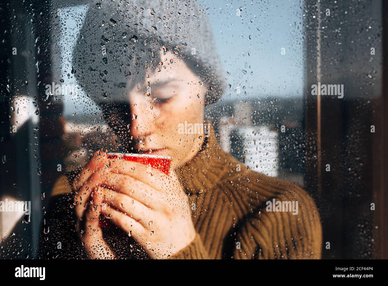 Drinking through window coronavirus hi-res stock photography and images ...