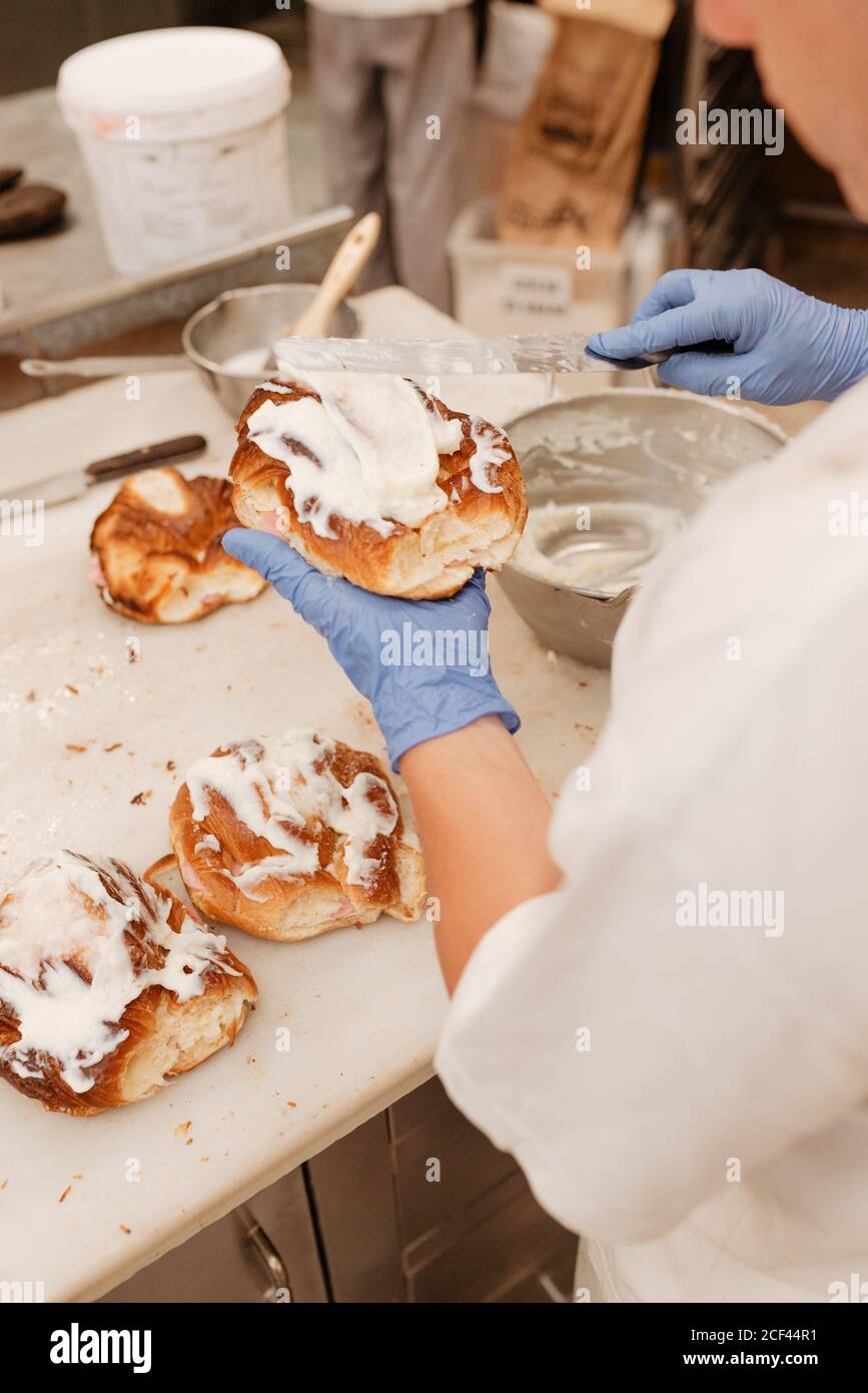 Smearing cream on bun hi-res stock photography and images - Alamy