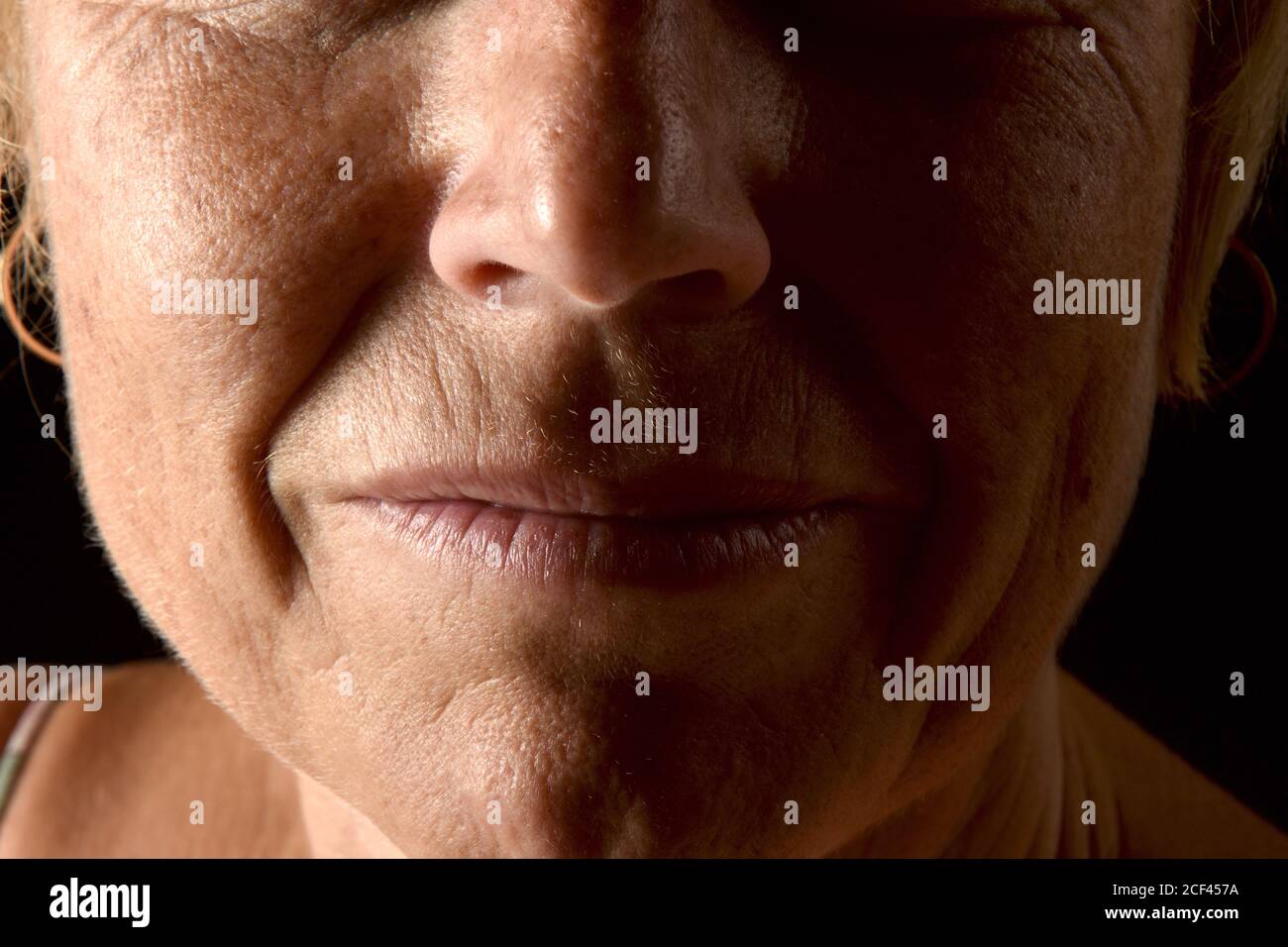 detail of the face of a fifty year old woman Stock Photo - Alamy