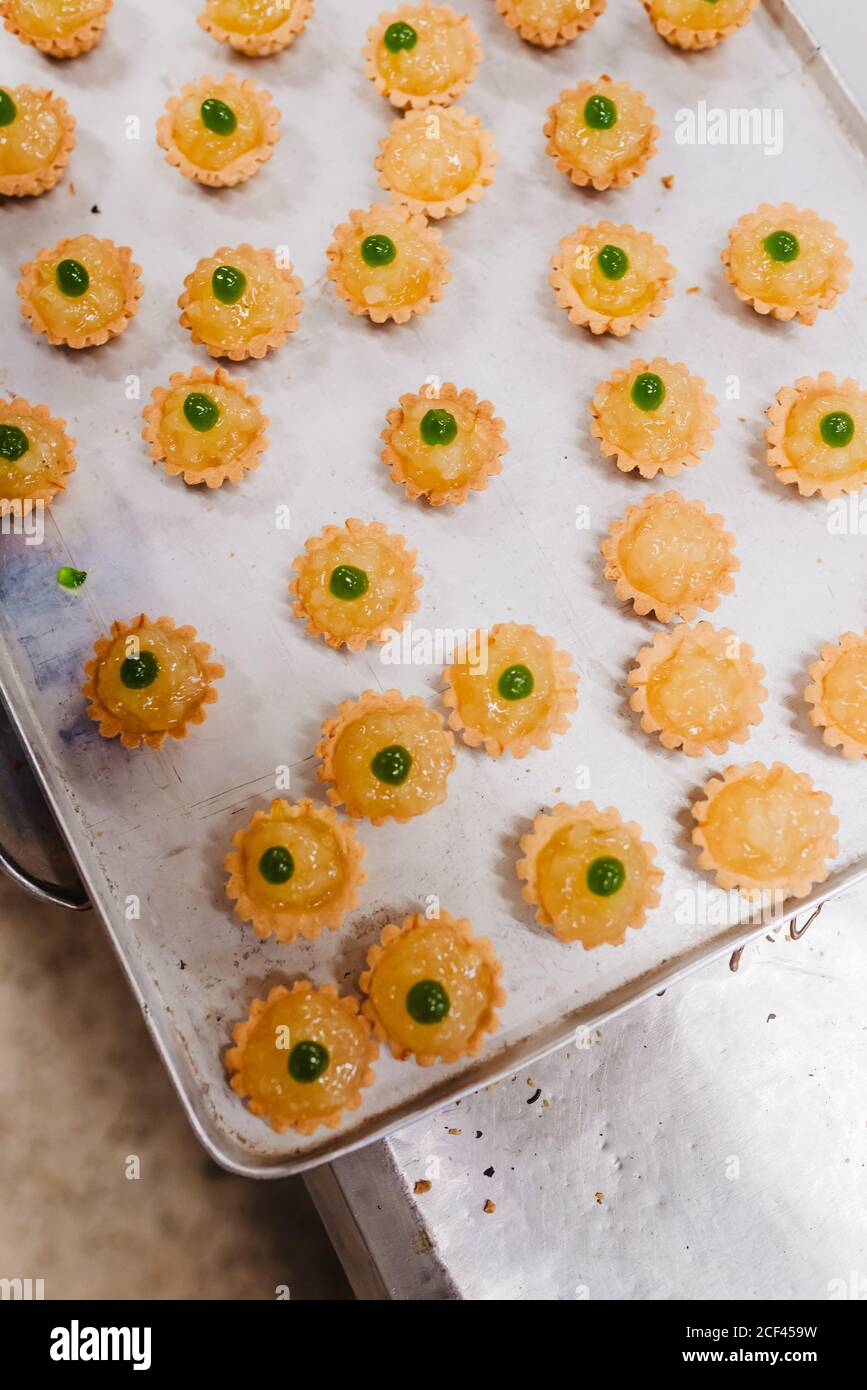 Closeup set of yummy pastry arranged on parchment paper Stock Photo - Alamy