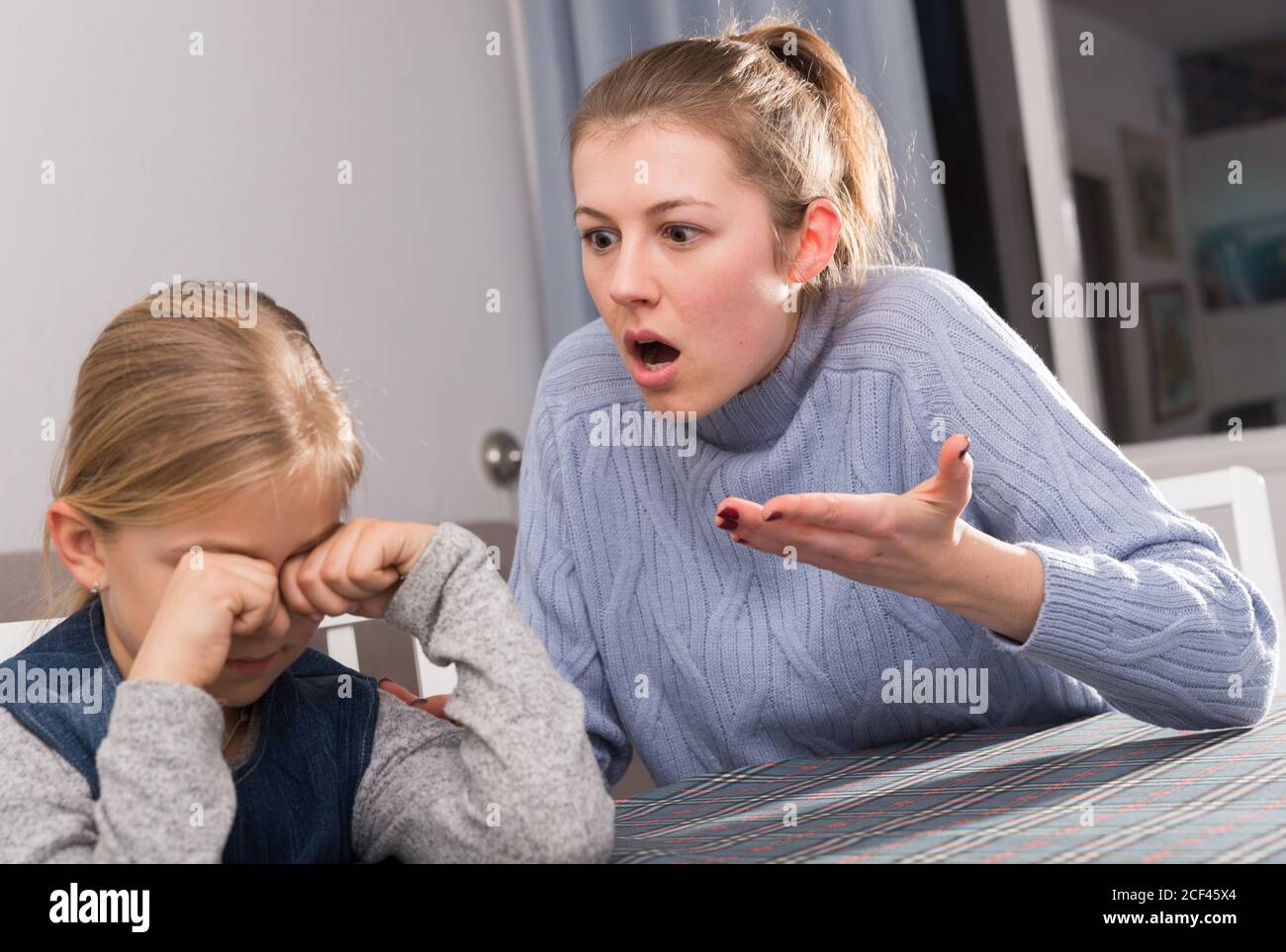 Adult mother lecturing her teenage daughter at home Stock Photo - Alamy