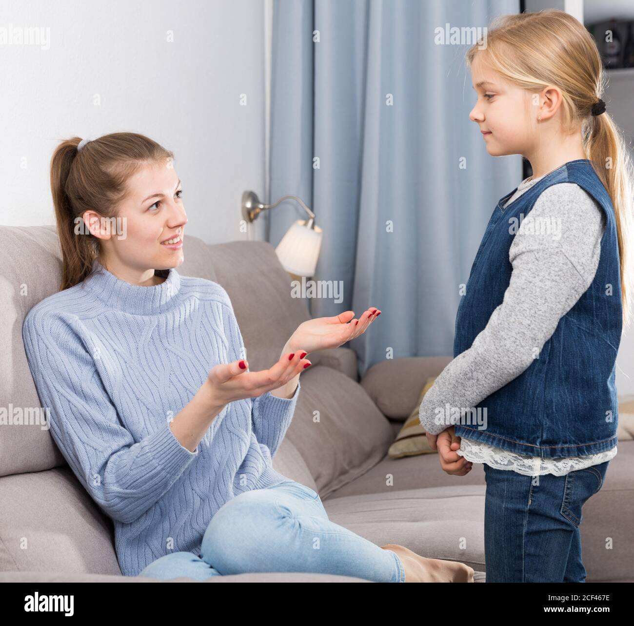 Adult mother lecturing her teenage daughter at home Stock Photo - Alamy