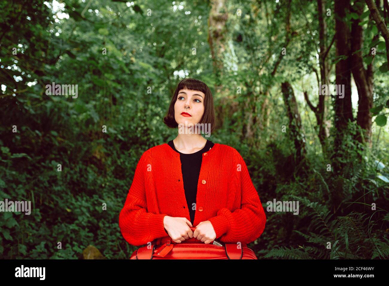 Big red suitcase hi-res stock photography and images - Alamy