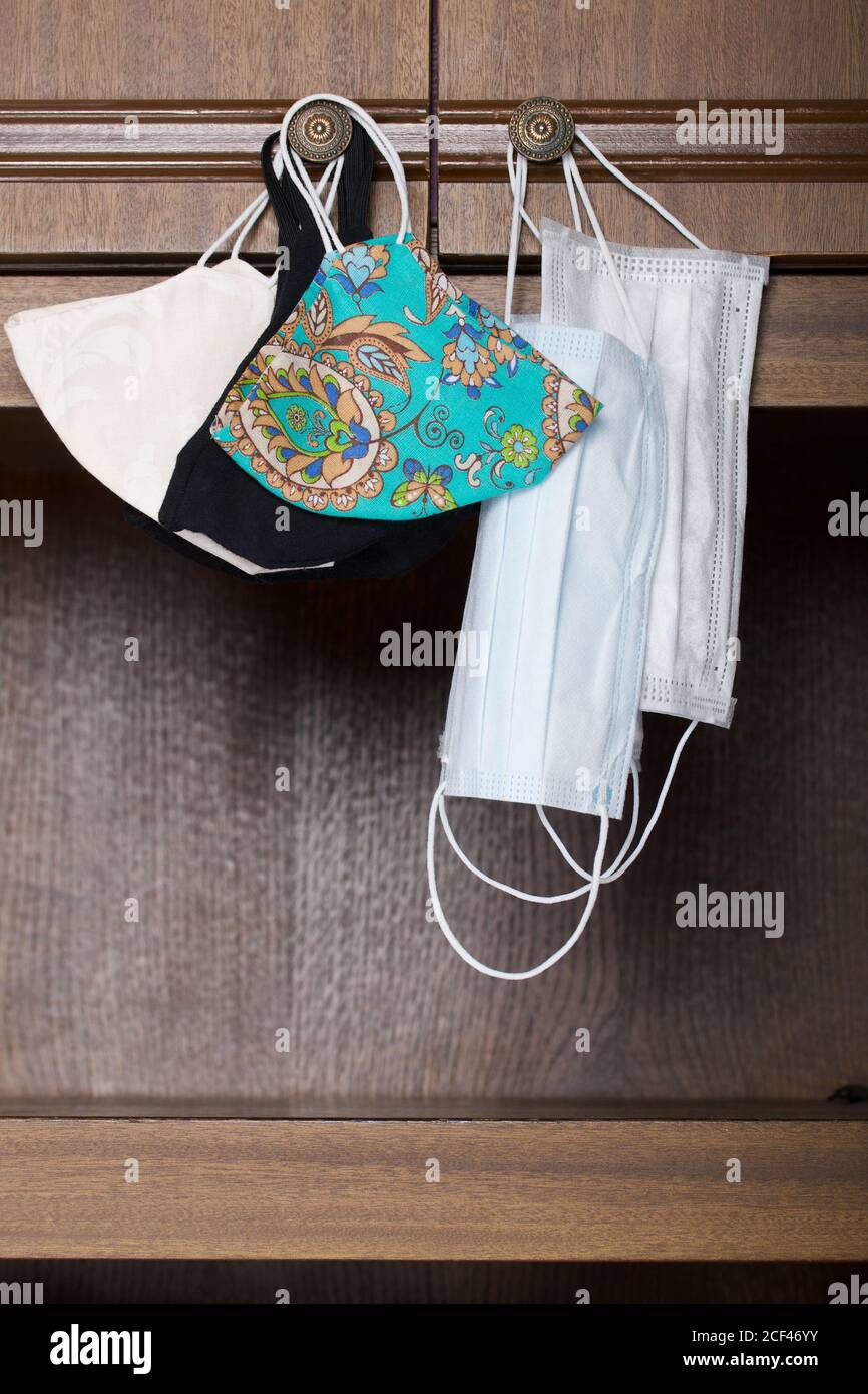 Medical and protective face masks. Different colors. Hang on the ...