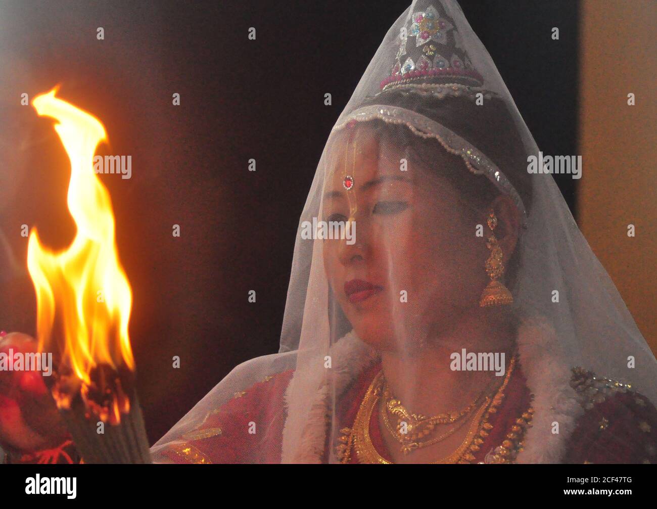 The Manipuri girls are performing at a cultural show at Radhamadhab ...