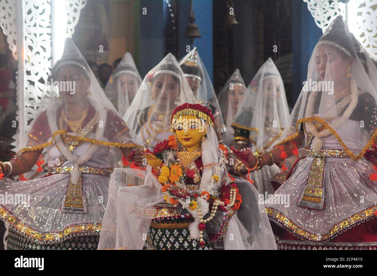 The Manipuri girls are performing at a cultural show at Radhamadhab ...