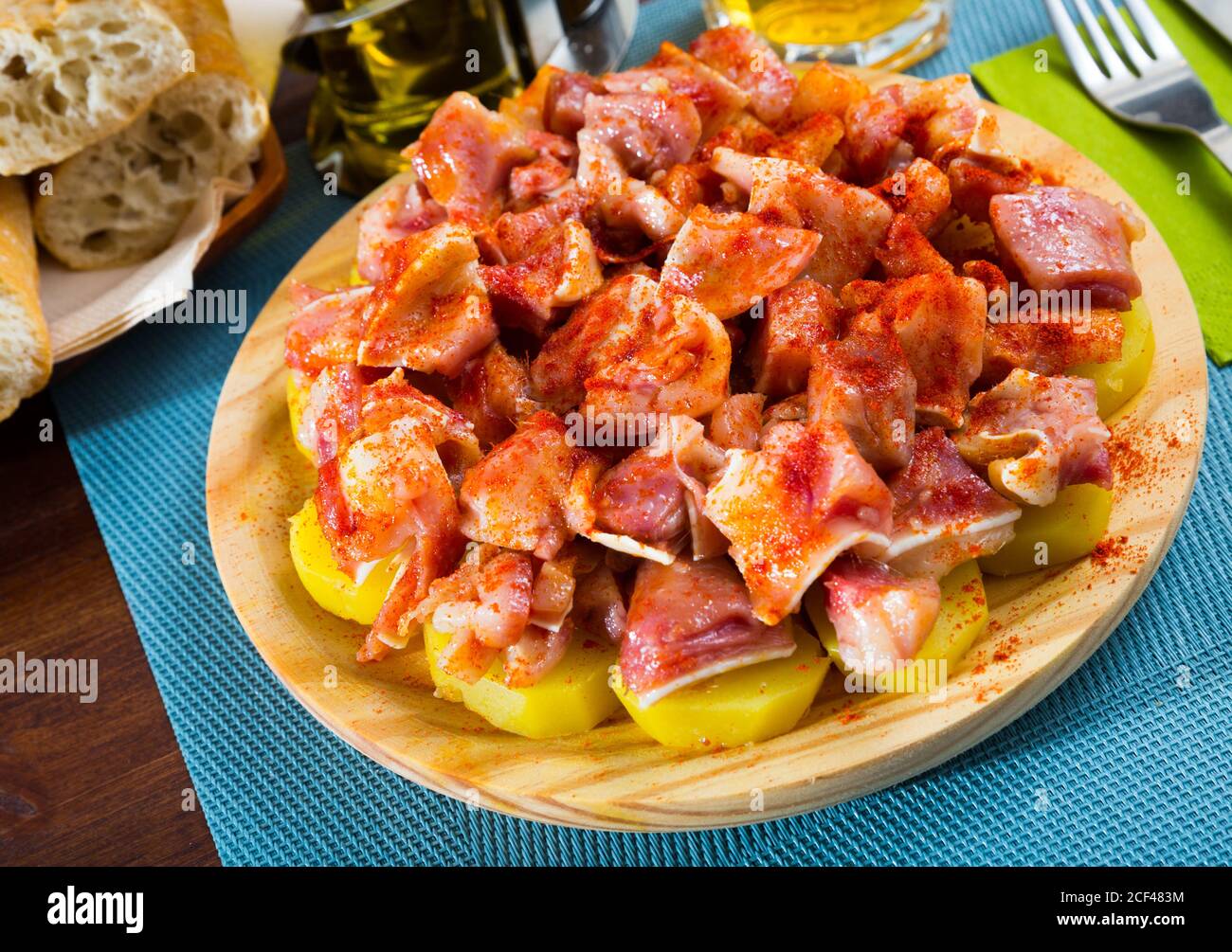 Close up of raw pork's ear with species at plate on table Stock Photo ...