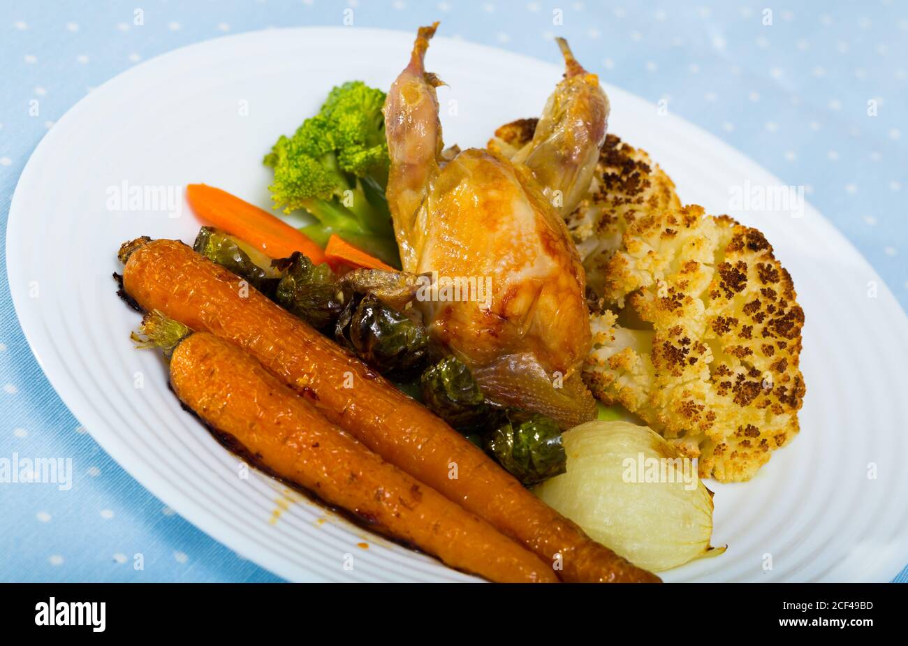 Delicious poultry dish - partridge baked with vegetables in honey ...