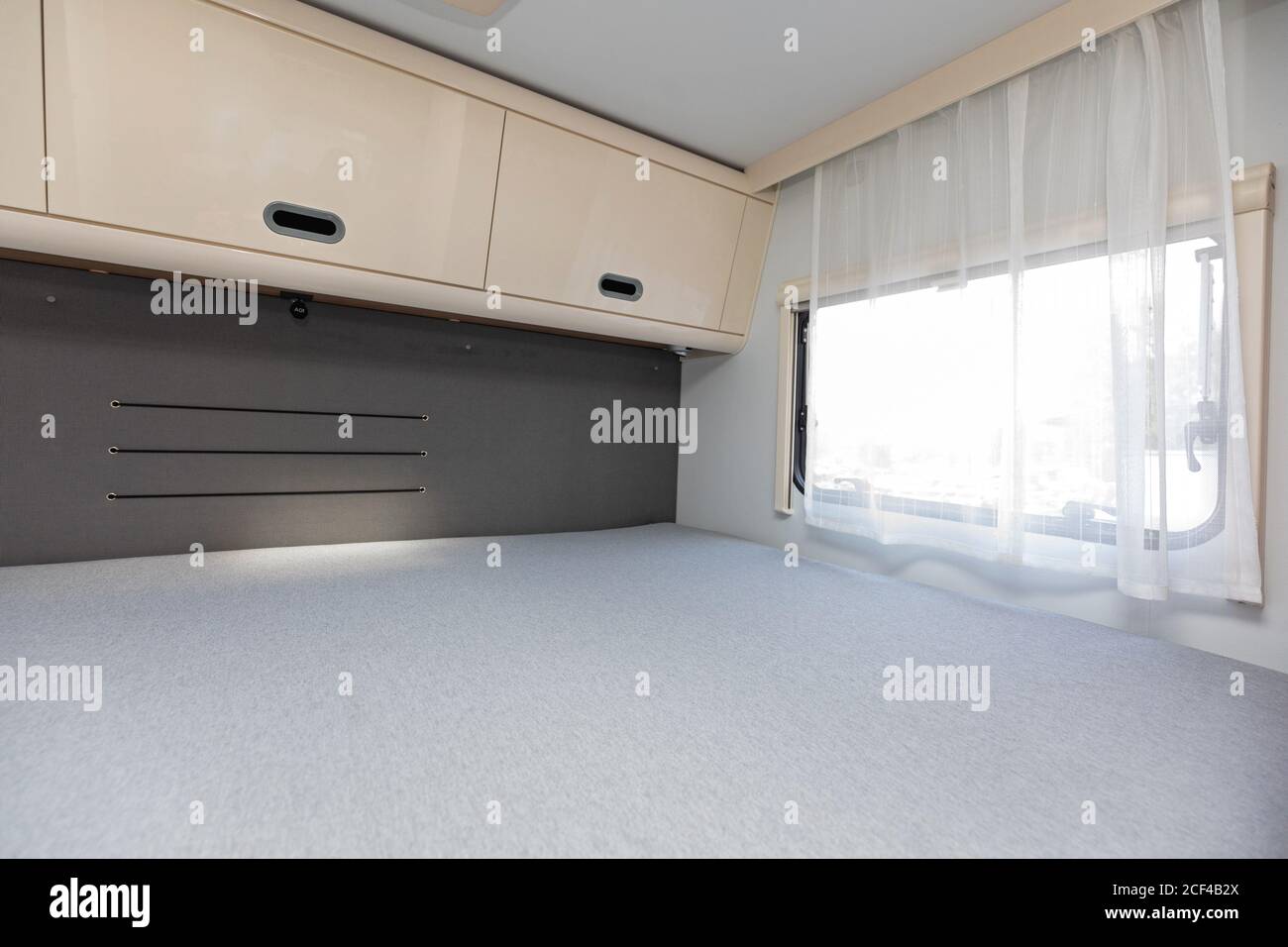 Big Bed in Mobile Home Camper Bedroom Stock Photo - Alamy