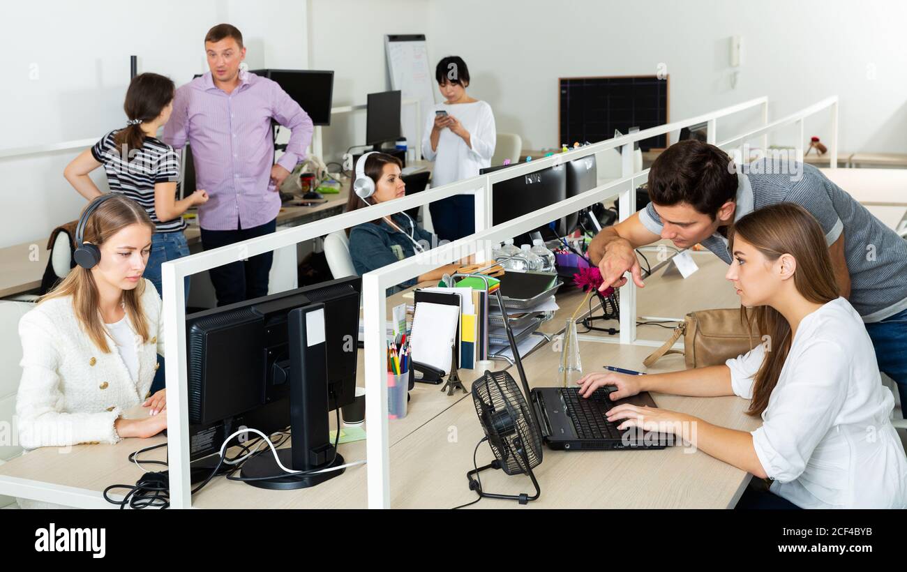 Working process in open space modern office with busy workers Stock ...