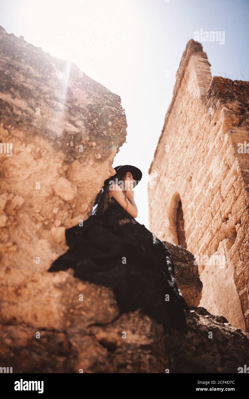 Beautiful female in ruins of old castle Stock Photo - Alamy