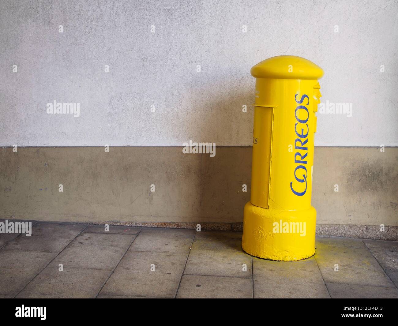 A Coruna, Spain - October 1, 2016 - Yellow mailbox of Correos in the ...