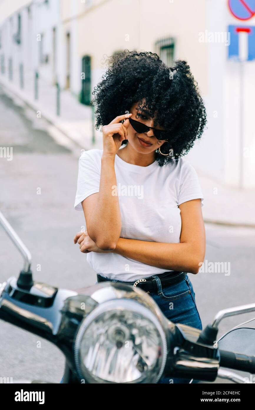 African woman on motorcycle hi-res stock photography and images - Alamy
