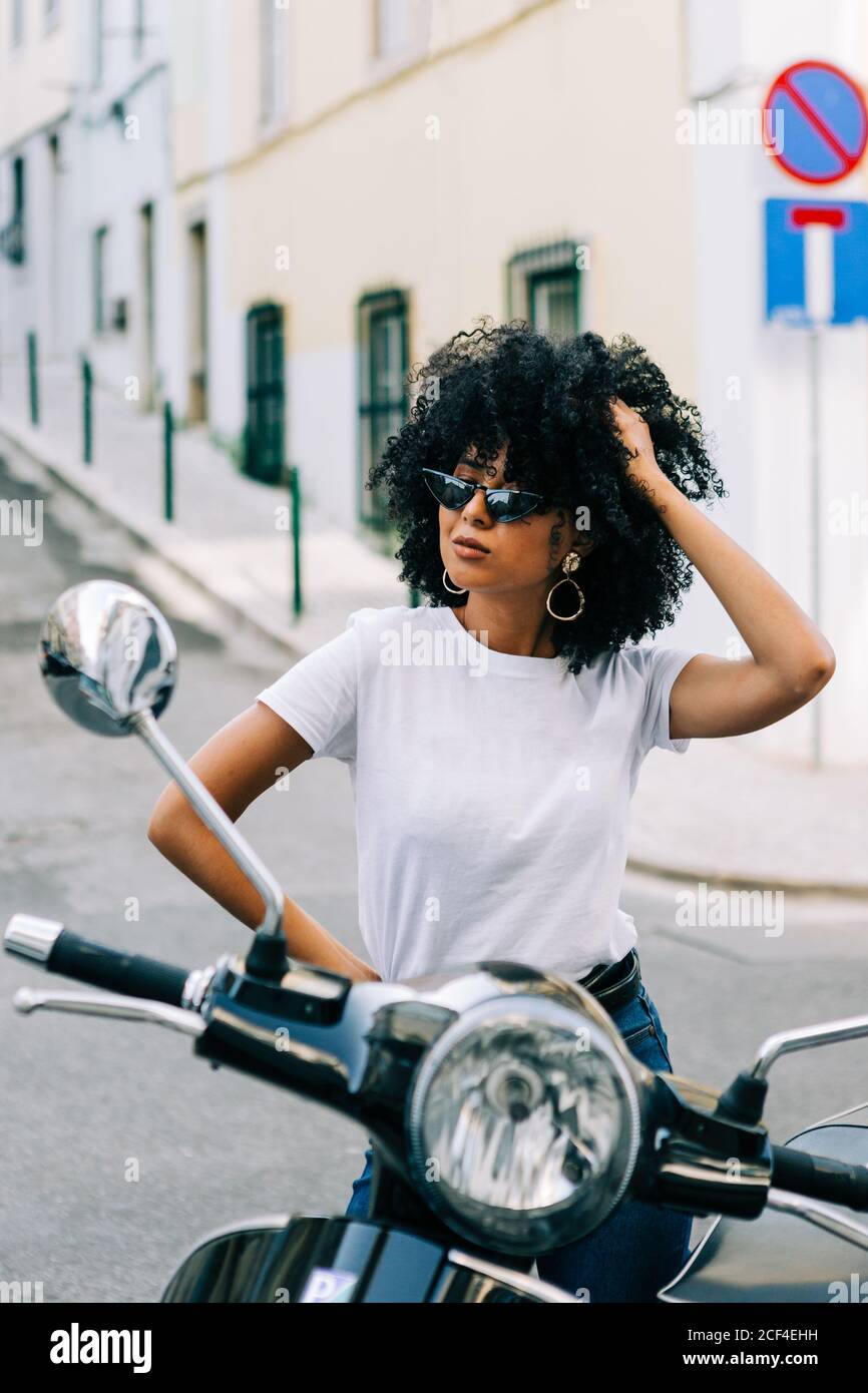 African woman on motorcycle hi-res stock photography and images - Alamy