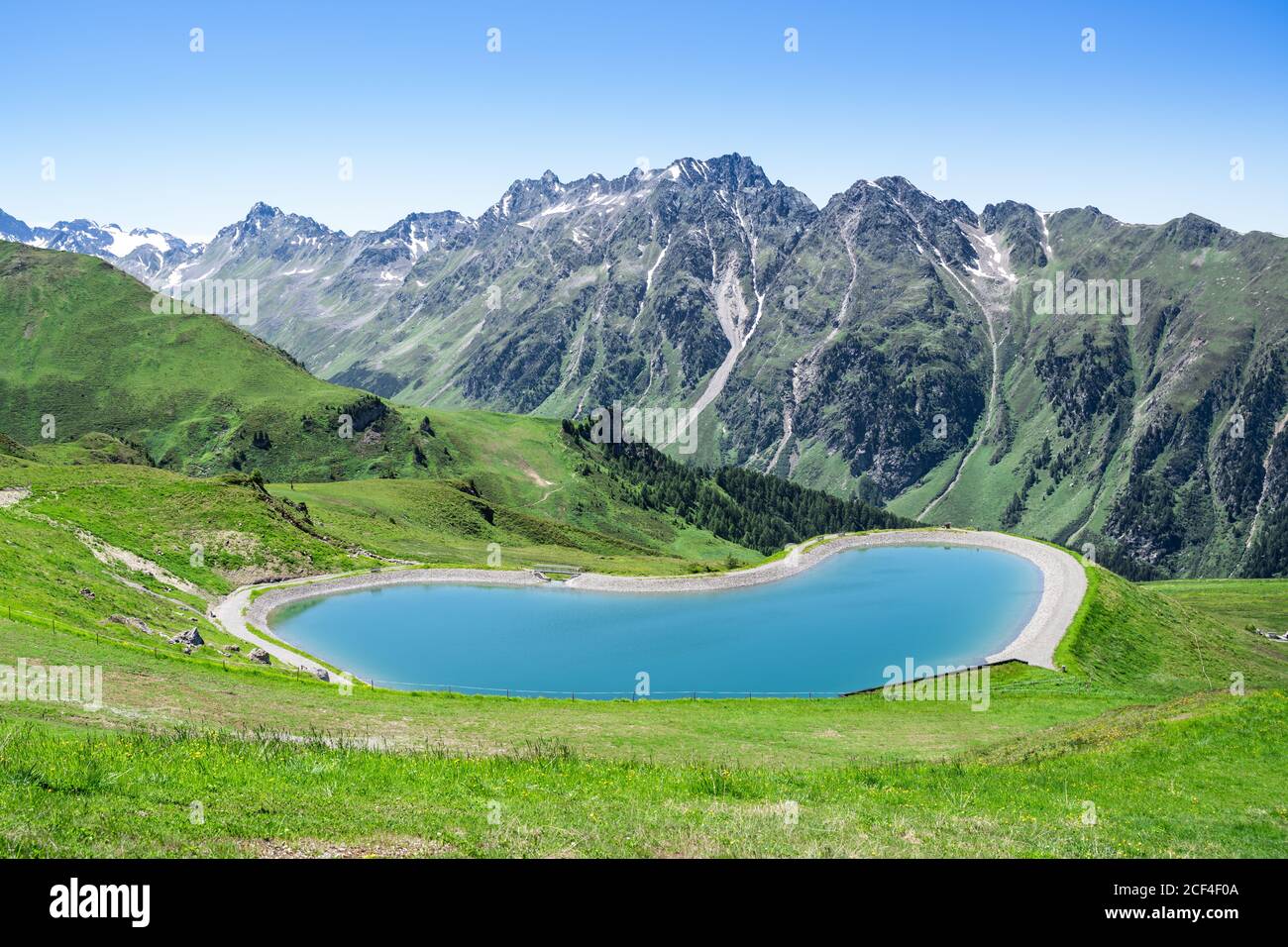 Lake In Mountains. Austrian Alps Travel Background Stock Photo - Alamy