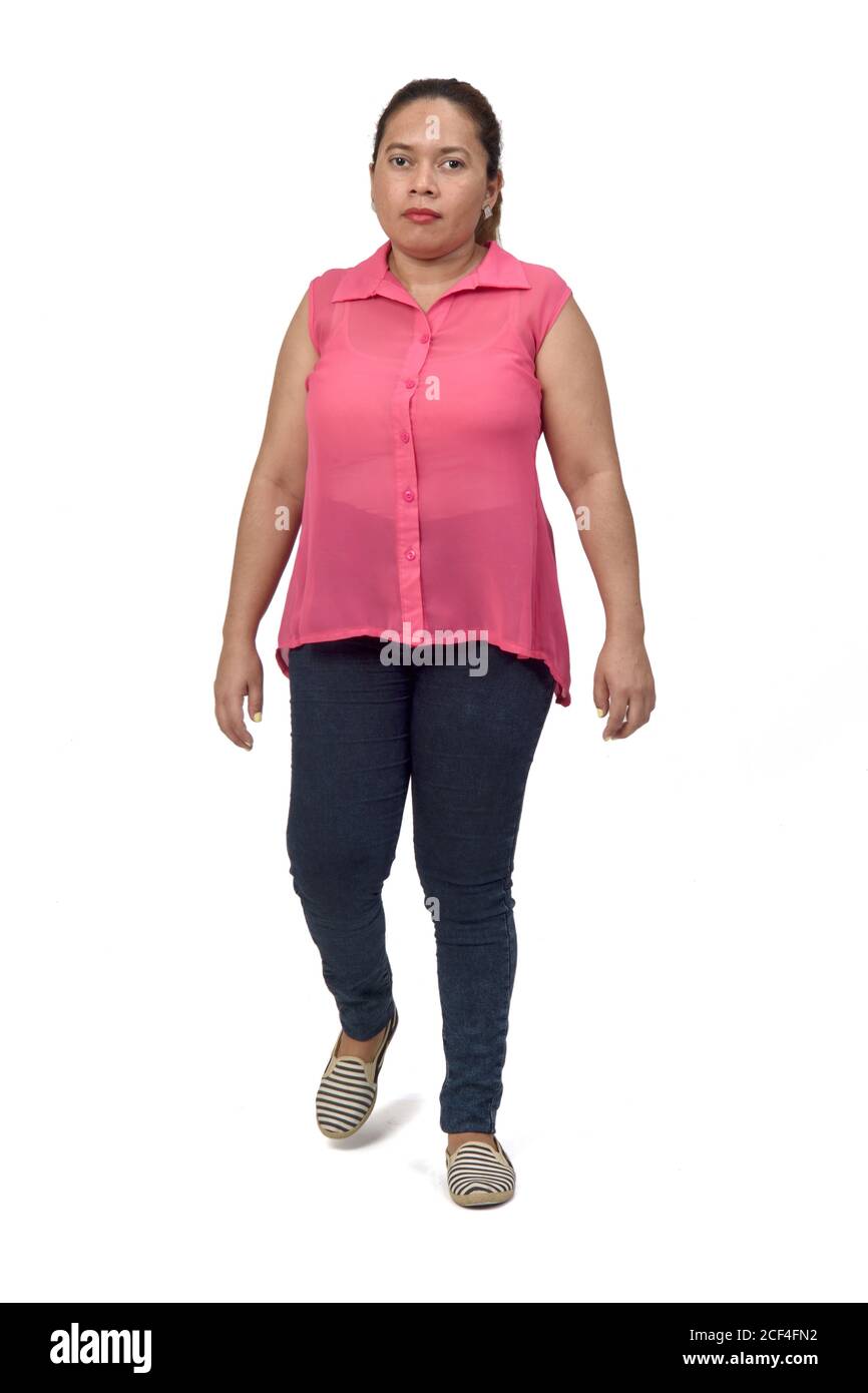 front view of a woman walking on white background Stock Photo - Alamy