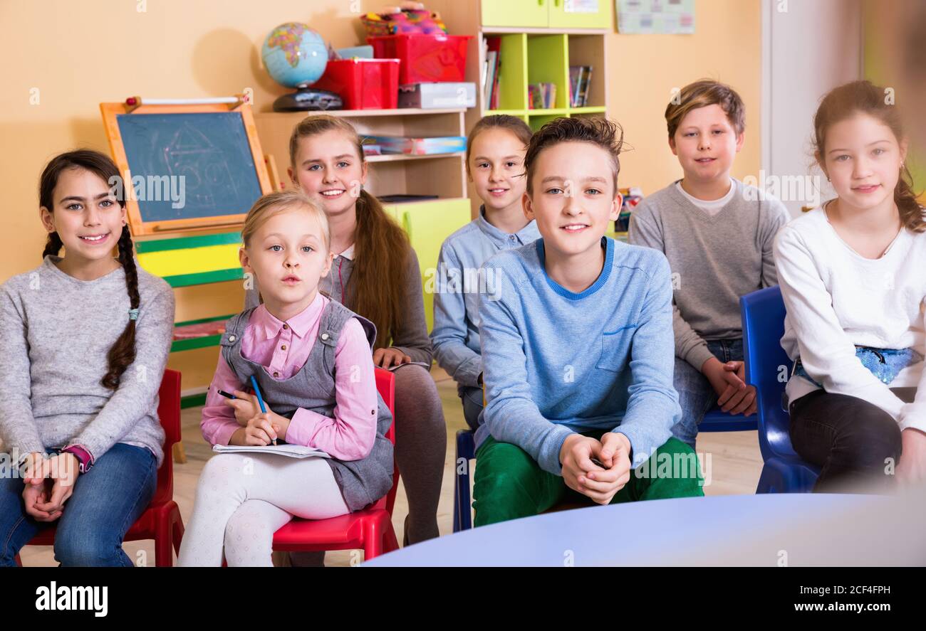 Group diligent school pupils hi-res stock photography and images - Alamy