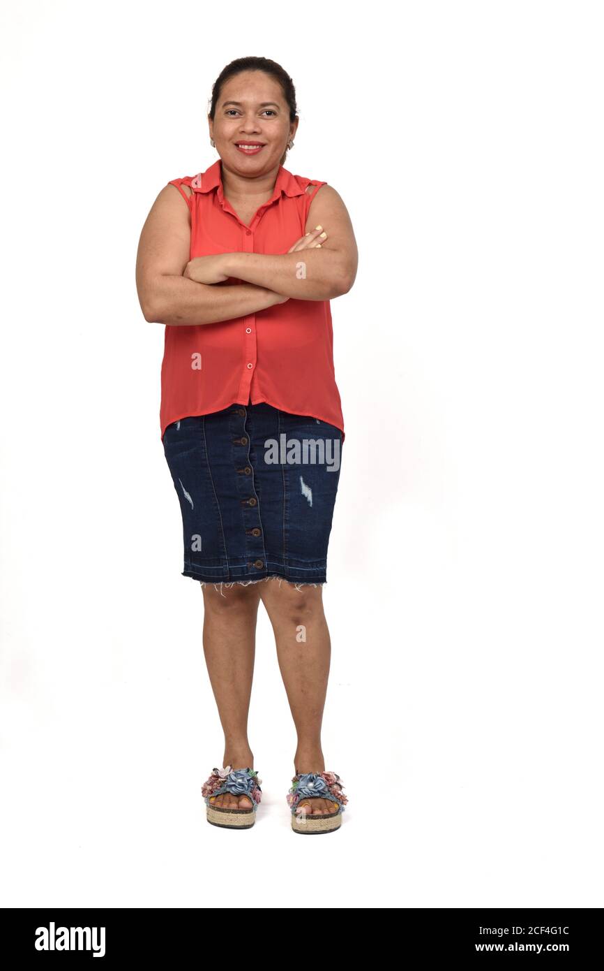 full portrait of latin woman on white background, arms crossed Stock ...