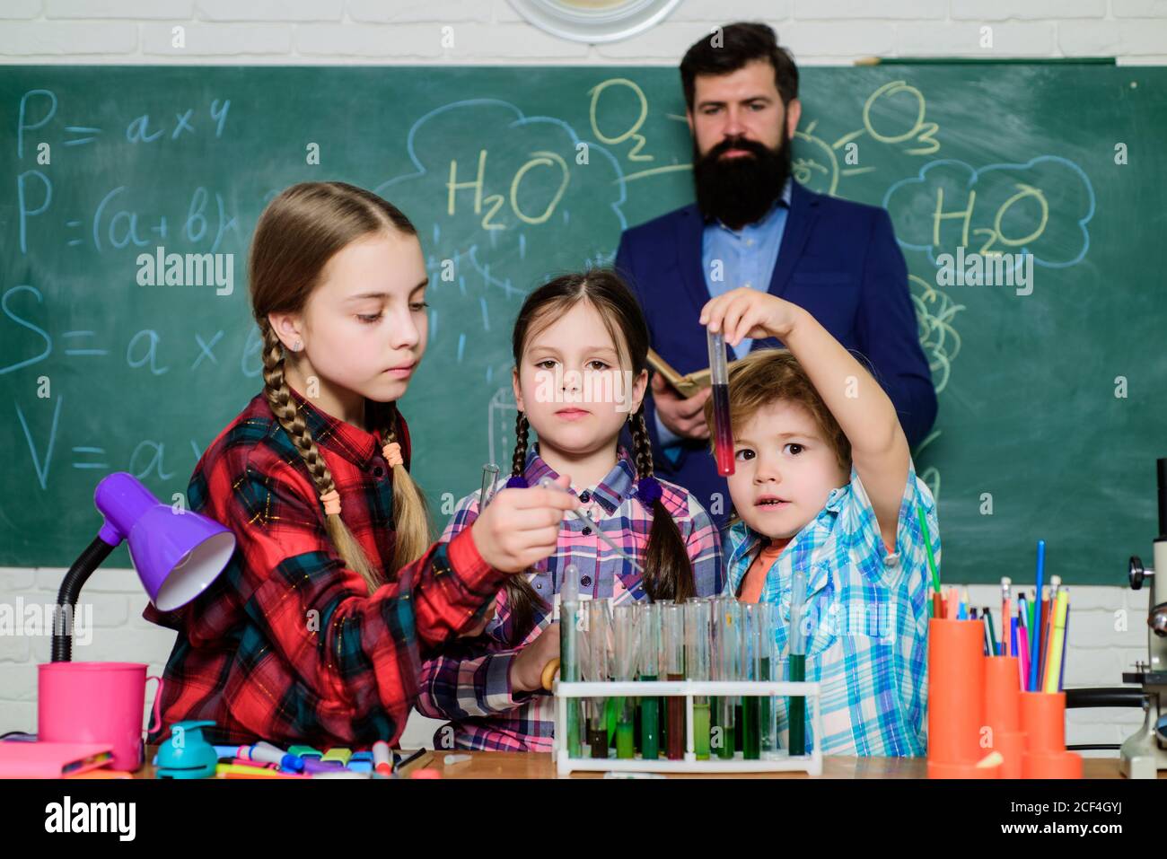 Teaching kids sharing important knowledge. Study with friends is fun ...