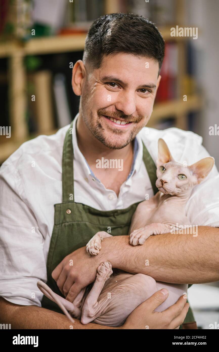 Positive craftsman in apron hi-res stock photography and images - Alamy