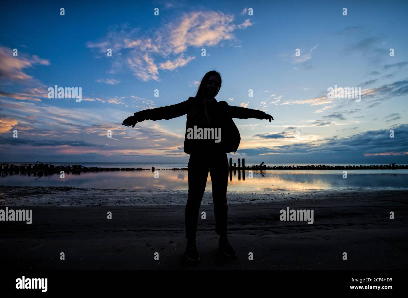 Girl on sunset background hi-res stock photography and images - Alamy