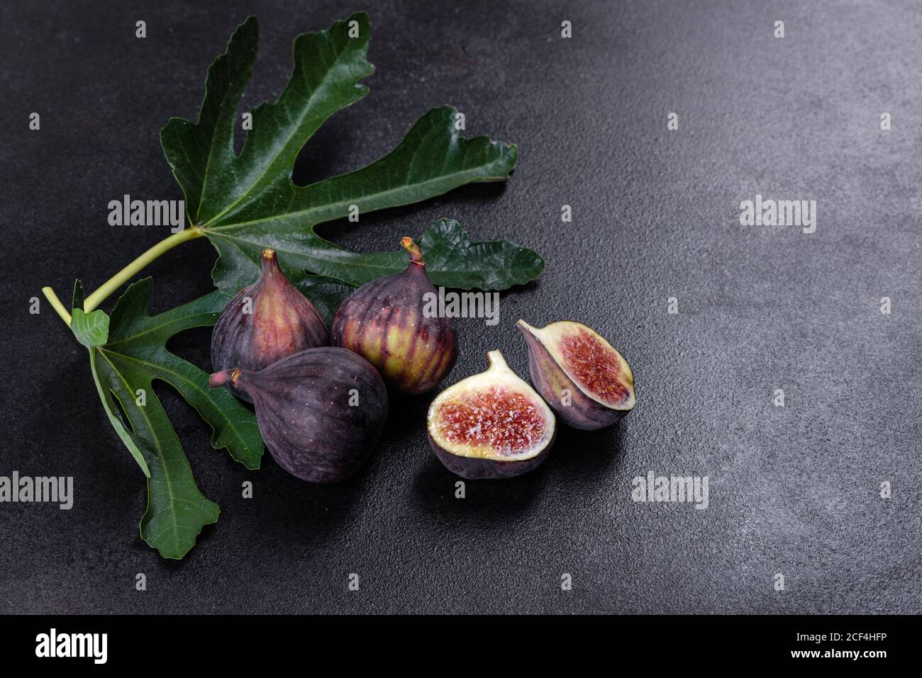 Fresh ripe figs on dark table. Healthy mediterranean fig fruit. Fresh ...