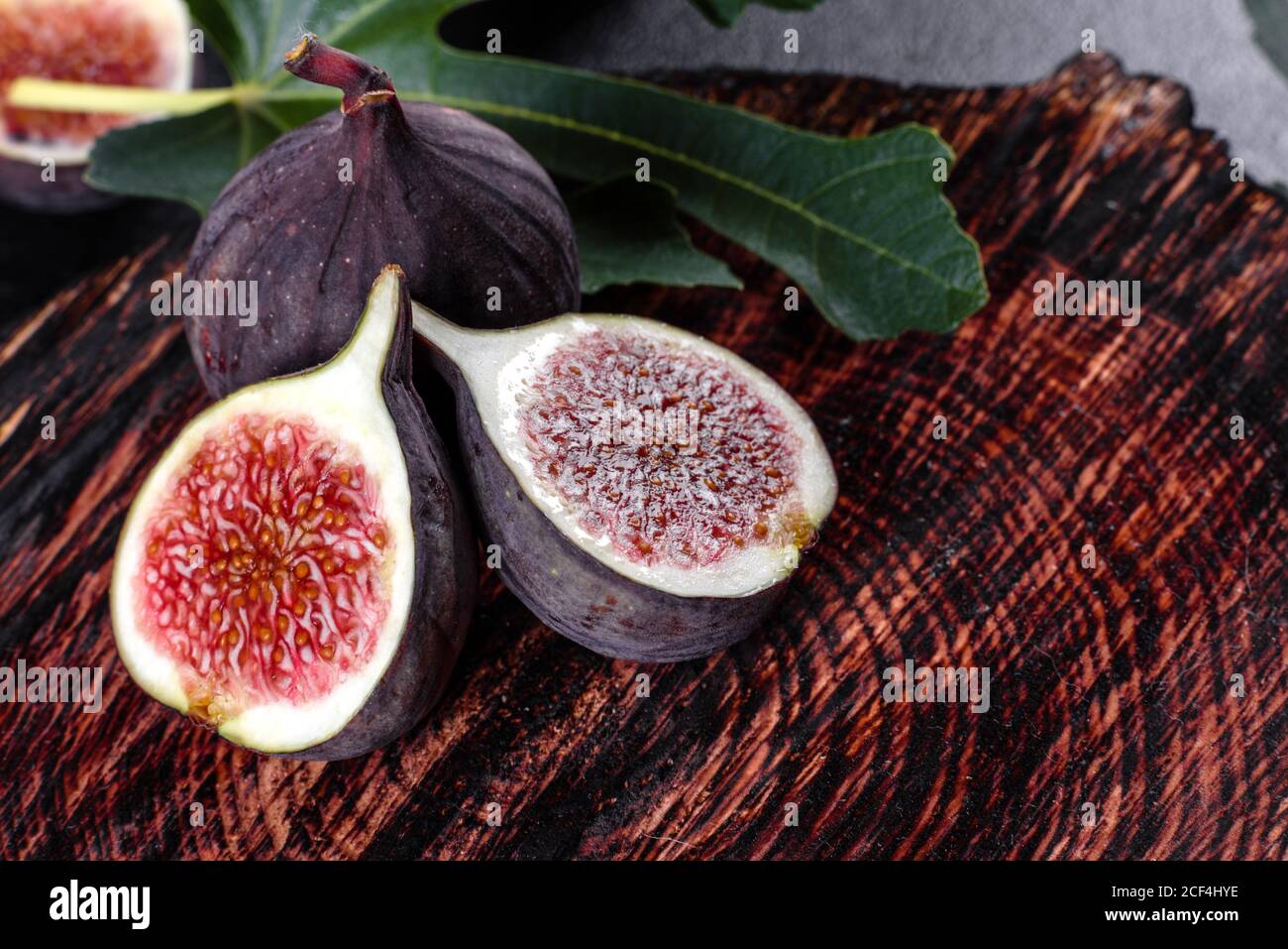 Fresh ripe figs on dark table. Healthy mediterranean fig fruit. Fresh ...