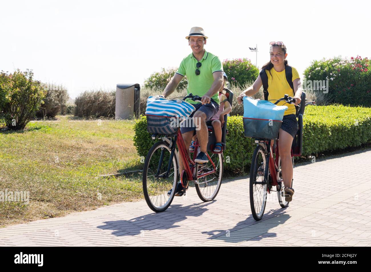 Family Riding Bicycle Outside. Happy People Doing Sports Stock Photo ...