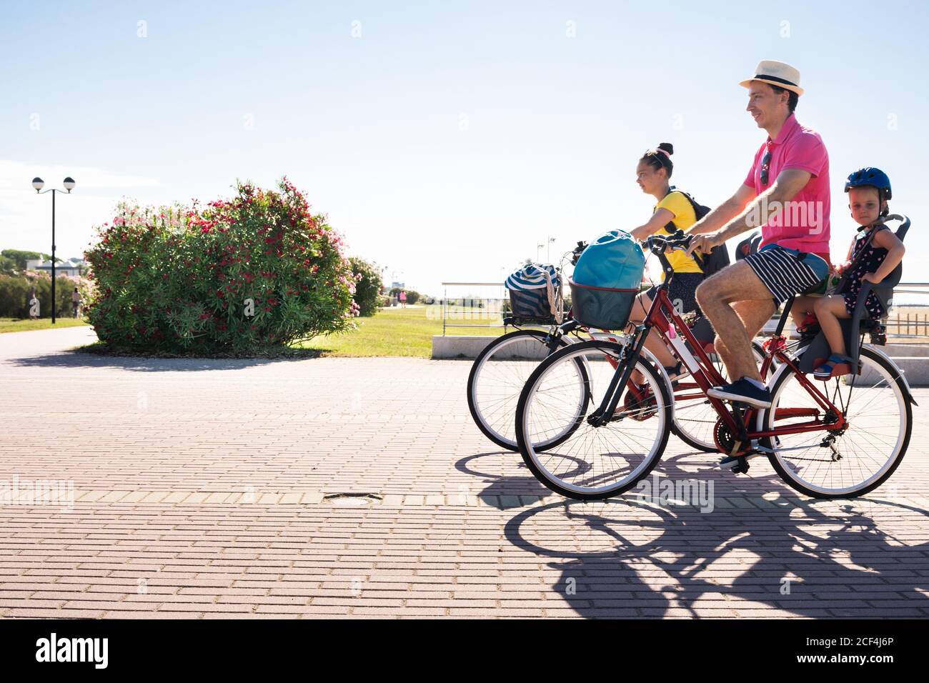 Family Riding Bicycle Outside. Happy People Doing Sports Stock Photo ...