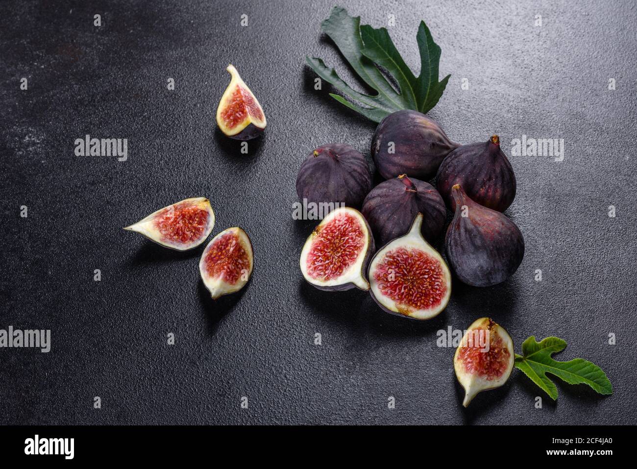 Fresh ripe figs on dark table. Healthy mediterranean fig fruit. Fresh ...
