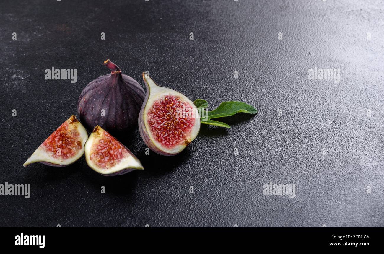 Fresh ripe figs on dark table. Healthy mediterranean fig fruit. Fresh ...