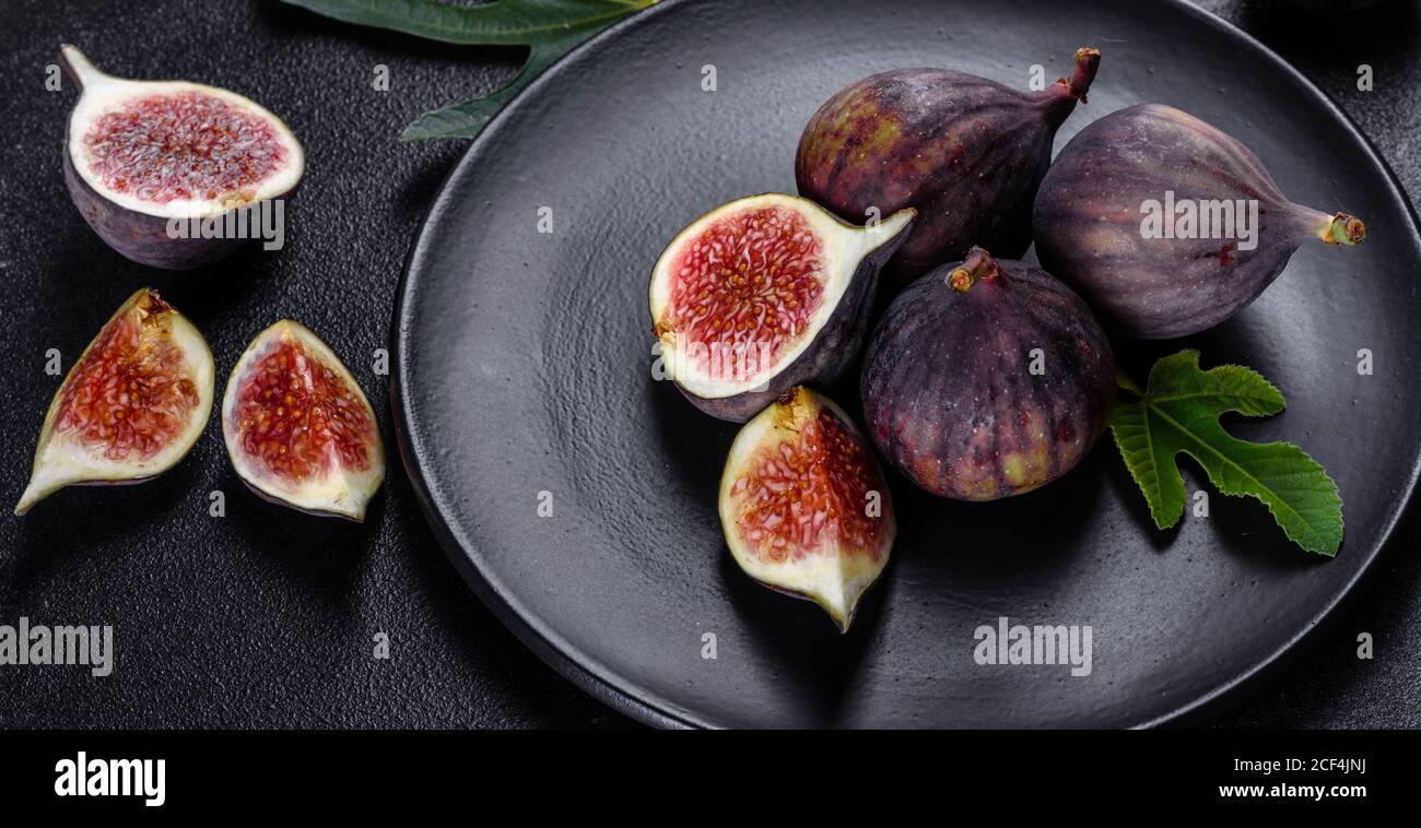 Fresh ripe figs on dark table. Healthy mediterranean fig fruit. Fresh ...