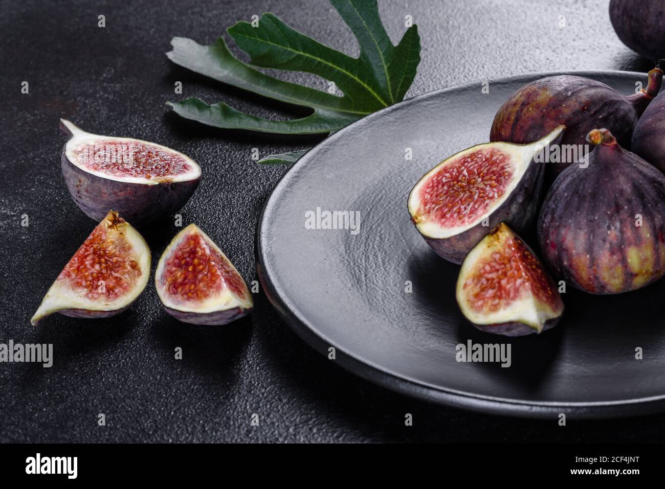 Fresh ripe figs on dark table. Healthy mediterranean fig fruit. Fresh ...