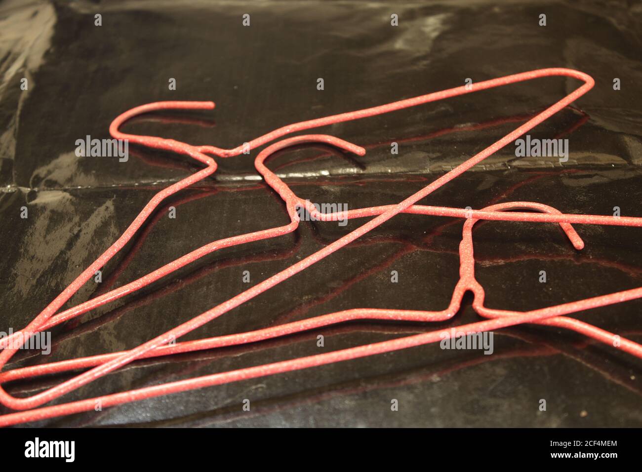 Wire clothes hanger hangers hi-res stock photography and images - Alamy