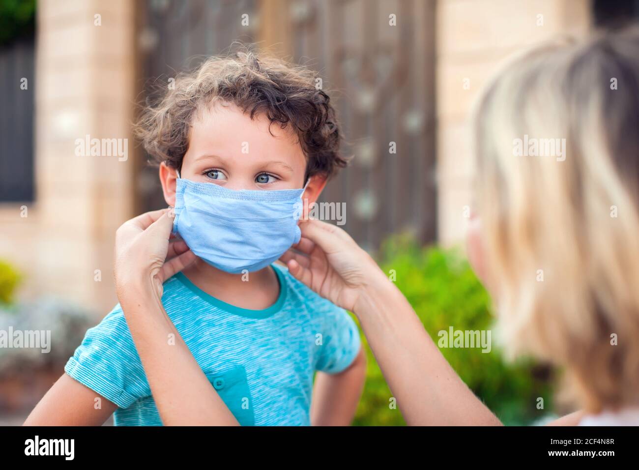 Boy mother wear protective hi-res stock photography and images - Alamy