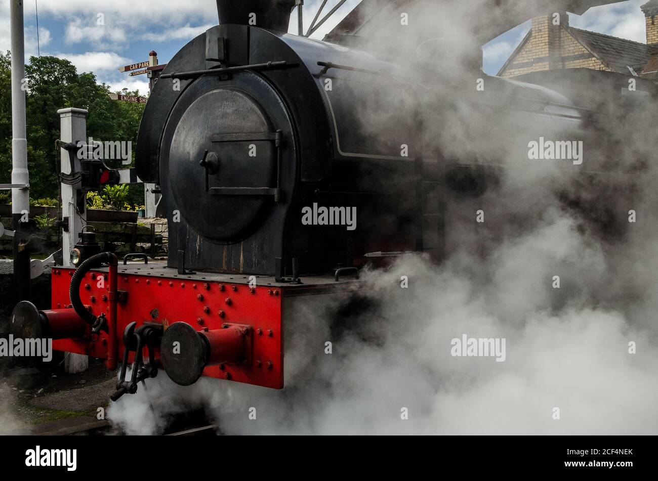 Steam Train Repulse, engulfed in steam, pulls out of Haverthwaite ...