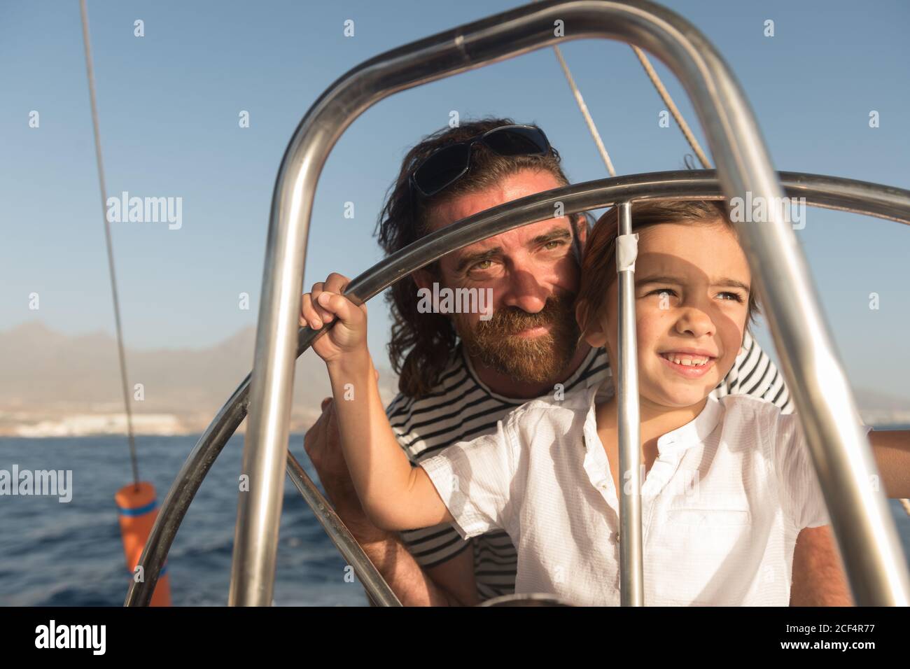 Father and daughter floating in the sea hi-res stock photography and ...
