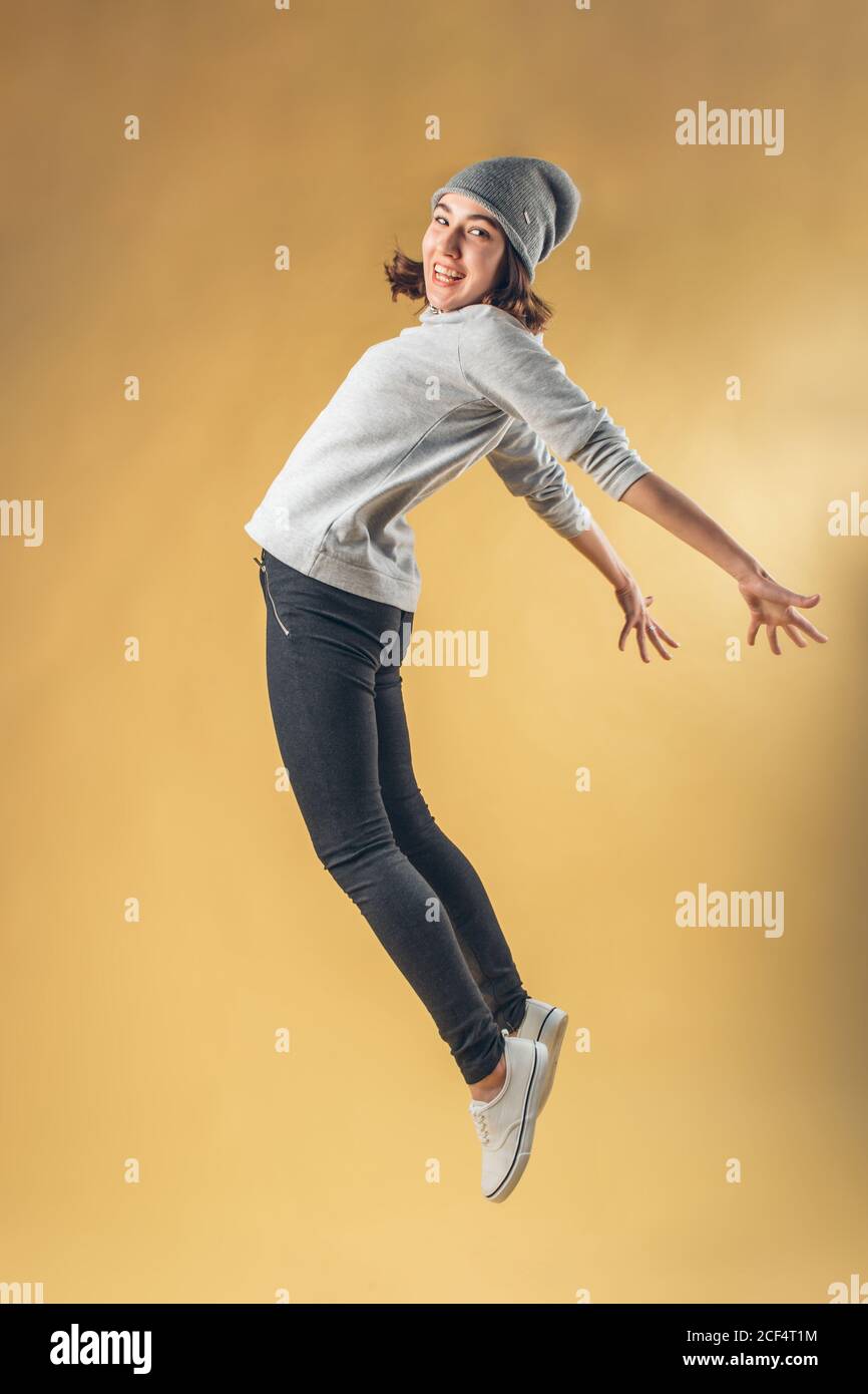 beautiful young girl dancing jumping Stock Photo - Alamy