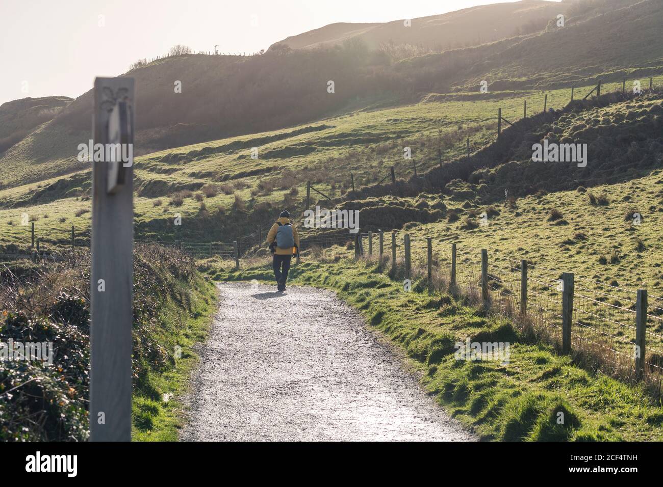 Man walking on narrow path hi-res stock photography and images - Alamy