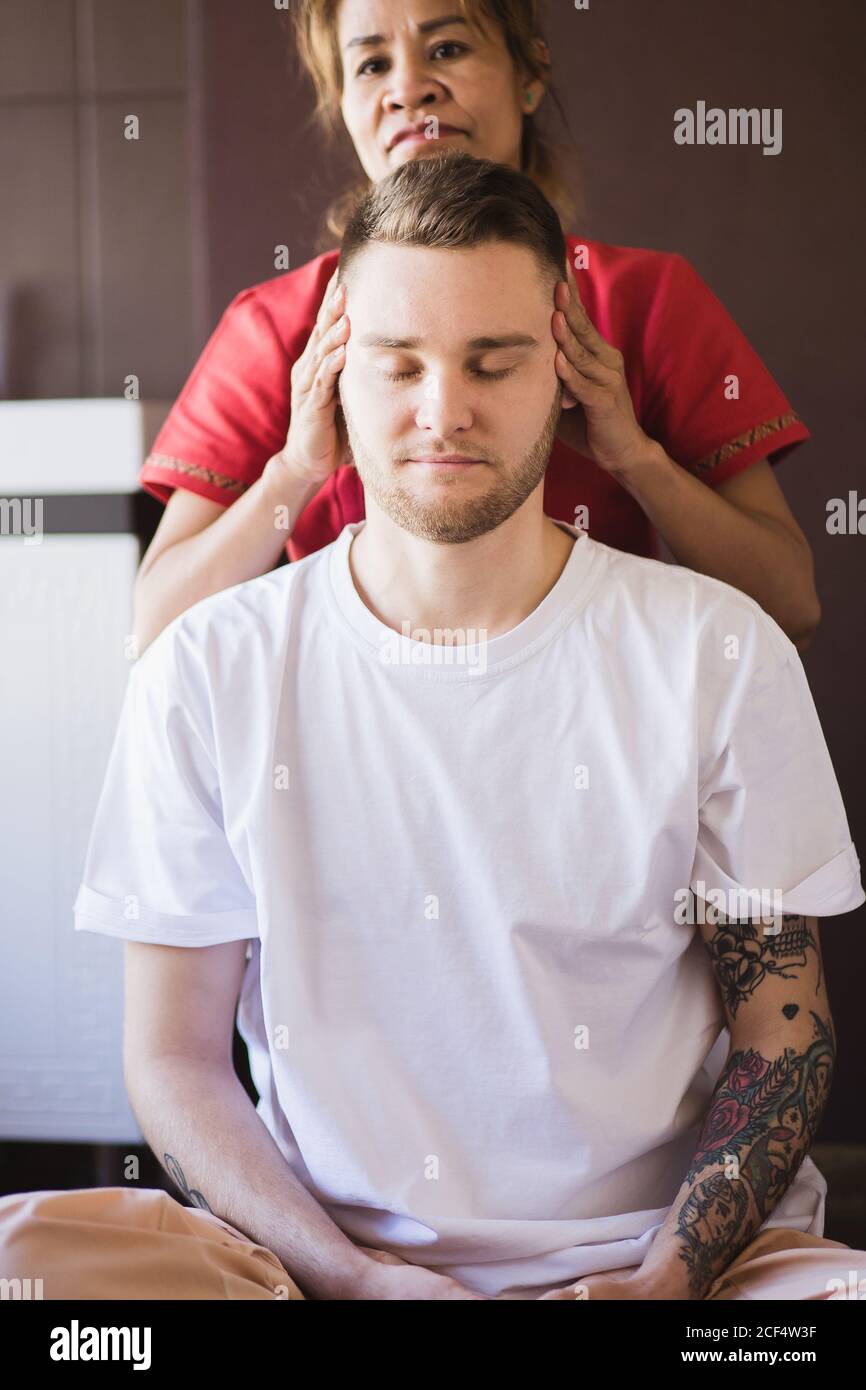 Man having head massage hi-res stock photography and images - Alamy