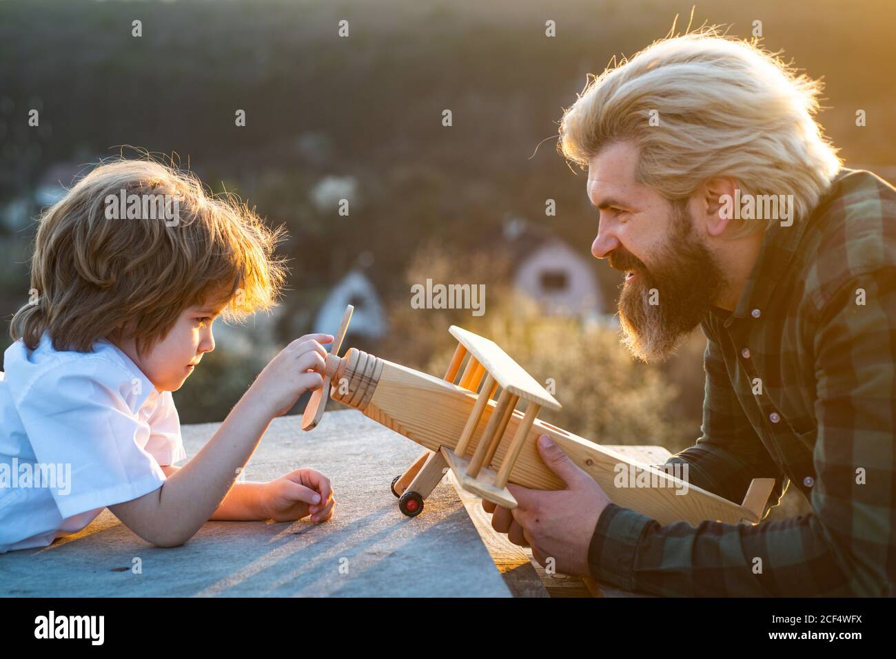 Father son park toy airplane hi-res stock photography and images - Alamy